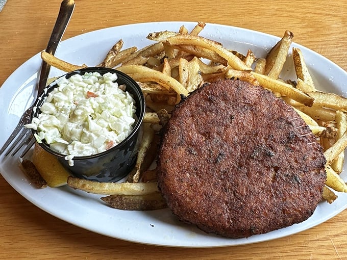 A crab cake that's actually about the crab, not the cake. Paired with those proudly "greasy" fries and homemade coleslaw&mdash;a holy trinity of satisfaction.