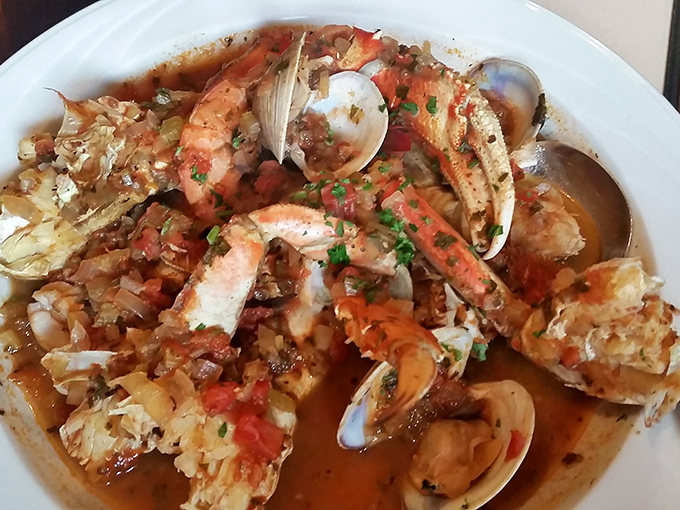This cioppino isn't just seafood stew&mdash;it's an underwater neighborhood block party where every resident showed up with their best moves.