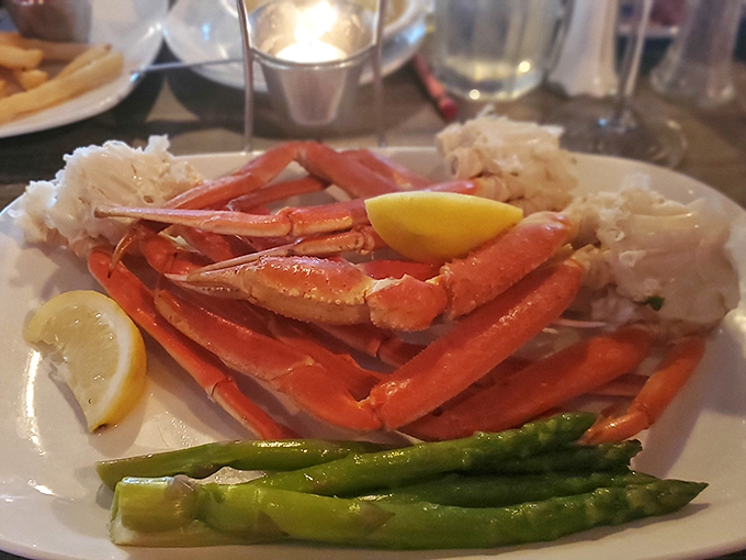 Snow crab legs arranged like nature's perfect architecture—a seafood skyscraper that requires nothing more than a squeeze of lemon and your undivided attention.