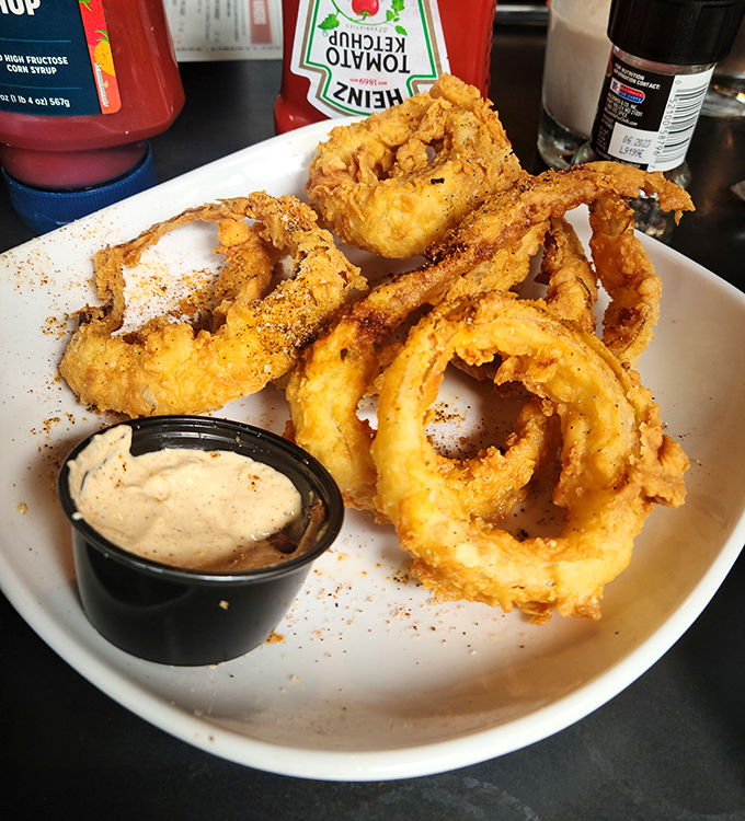 Buttermilk-battered rings of joy that prove onions can be absolutely magnificent when treated properly.
