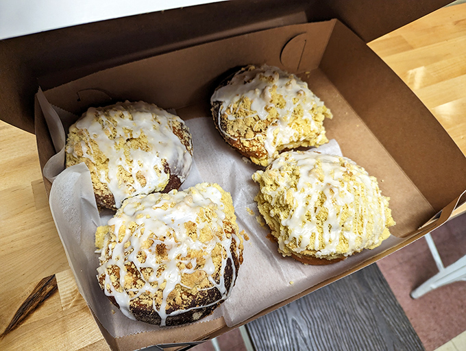These crumb buns look like they're wearing little sweaters knitted from butter, sugar, and cinnamon. Comfort food in its most literal form.