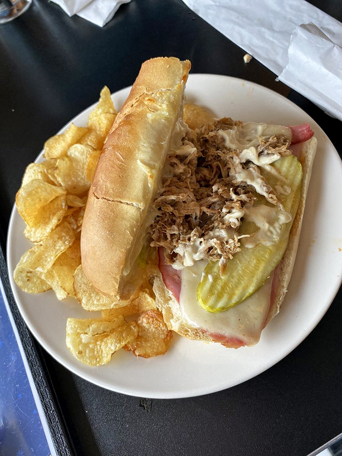 This Cuban sandwich doesn't just speak Spanish; it sings it, with layers of flavor performing a perfect harmony on a stage of crispy bread.