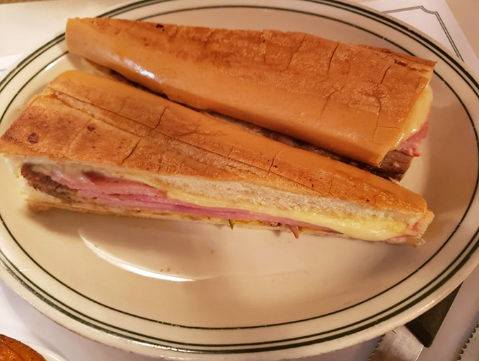 The Cuban sandwich &ndash; a perfectly pressed masterpiece of ham, roast pork, Swiss cheese, pickles, and mustard that's worth crossing state lines for.