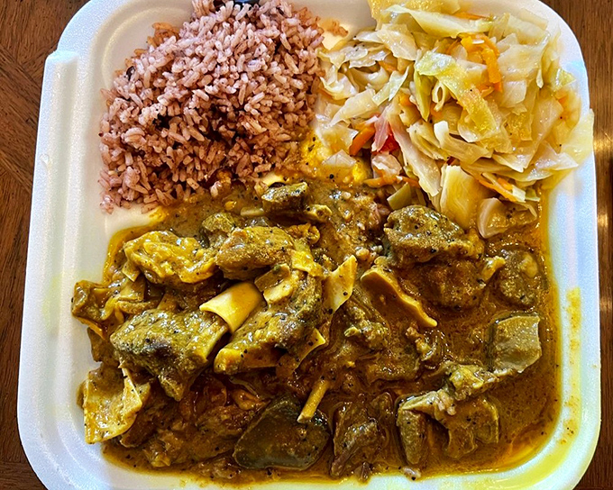 Curried goat that transforms a humble meat into royalty, with a golden sauce that's both complex and comforting.