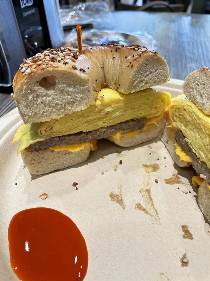 The breakfast sandwich that ruins all other breakfast sandwiches. A properly seeded bagel cradles eggs and cheese in a handheld masterpiece worth setting your alarm for.