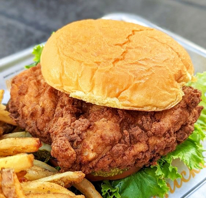 Behold the Deluxe Chicken Sandwich in all its glory&mdash;where crispy meets fresh in a bun-hugged romance that puts fast food chains to shame.