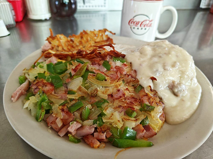 Not just any Denver omelet &ndash; this one's loaded with ham, peppers, and enough cheese to make Colorado jealous, all crowned with crispy hash browns.