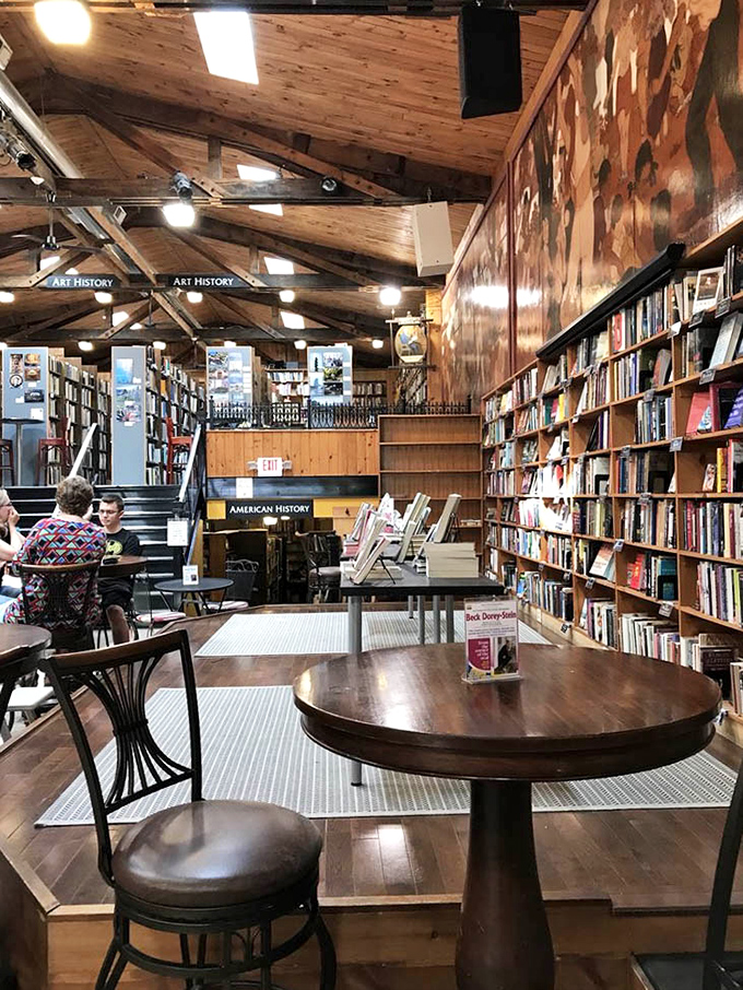 Every great bookstore knows reading requires proper seating—these tables offer front-row views to the theater of browsing bibliophiles.