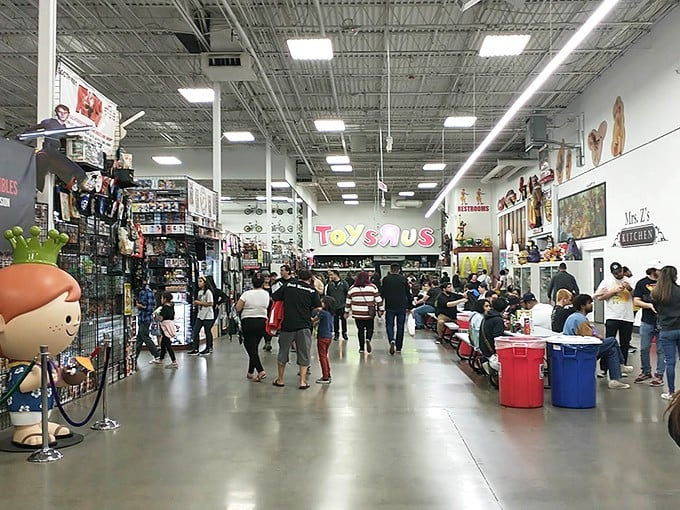 Where nostalgia meets commerce in a bustling marketplace. The Toys R Us sign is a bittersweet reminder of childhood shopping trips past.