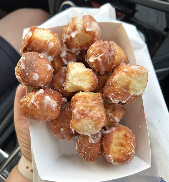 Bite-sized happiness in a box. These donut holes prove that sometimes the best things come in small, sugar-coated packages.