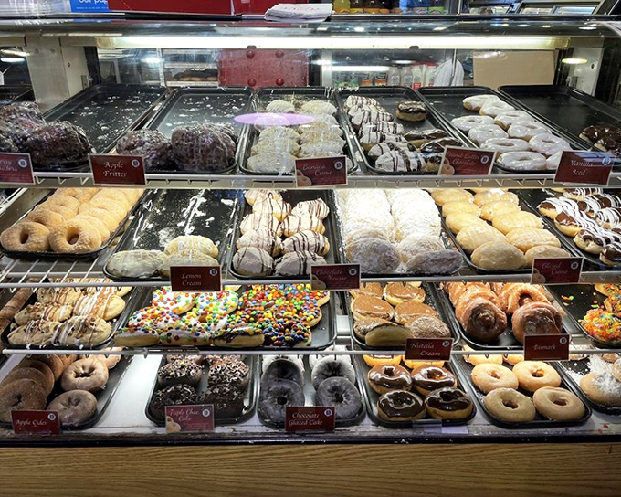 Donut heaven exists, and it's organized in neat rows. From classic glazed to creative concoctions, decision paralysis has never been so delicious.