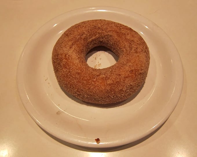The humble donut, elevated to art form. This cinnamon-sugar masterpiece is the perfect companion to that legendary coffee everyone keeps talking about.