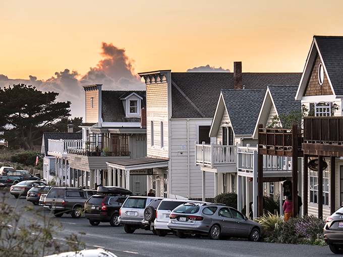 Golden hour transforms Mendocino's Victorian facades into a painter's palette. The light here makes even parked cars look like they're posing for a magazine shoot.