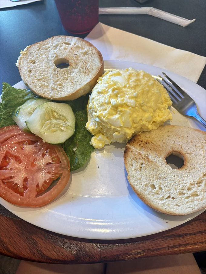The egg salad bagel platter&mdash;where simplicity meets perfection. Fresh veggies standing by, ready to join this creamy, protein-packed party.