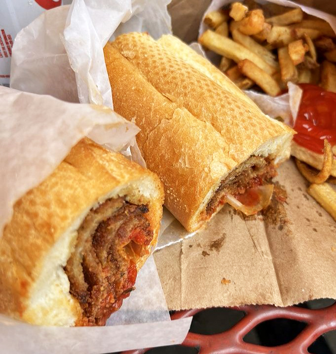 The eggplant sandwich that converts even the most devoted carnivores into temporary vegetable enthusiasts.