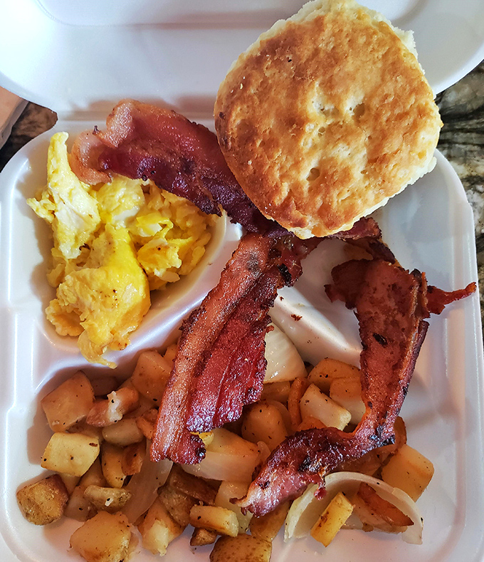 The breakfast of champions: crispy bacon, farm-fresh eggs, and a biscuit that could make a grown Georgian weep. Morning salvation comes in styrofoam.