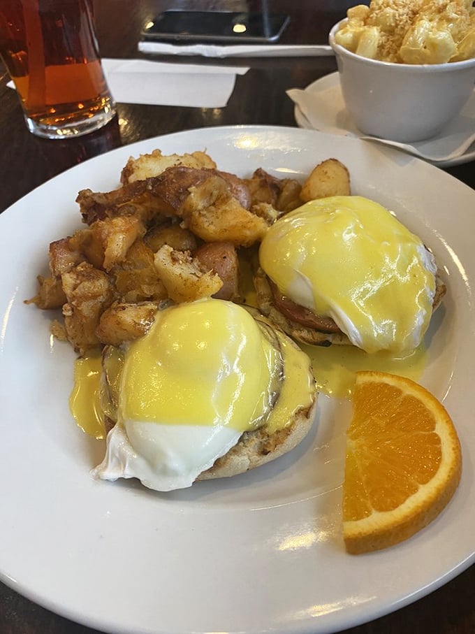 Eggs Benedict: where poached eggs meet hollandaise in a morning romance that's lasted centuries. The home fries are the perfect third wheel.