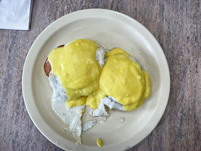 Eggs Benedict: where hollandaise sauce meets its destiny. Comfort food that makes Monday mornings slightly less offensive.
