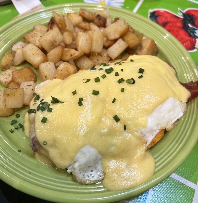 Eggs Benedict: where hollandaise sauce flows like liquid sunshine over perfectly poached eggs, transforming an English muffin into breakfast royalty.