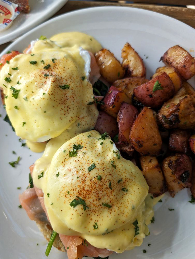 Eggs Benedict that would make the pope himself convert to the Church of Brunch. That hollandaise sauce is practically liquid sunshine.