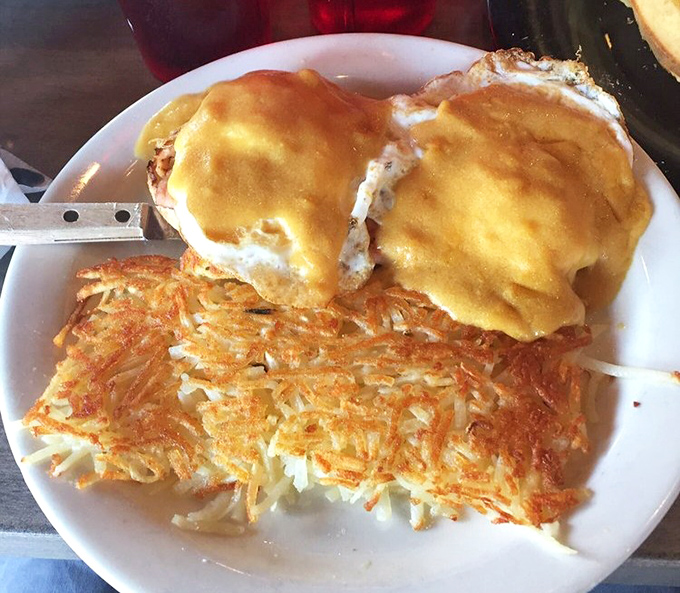 Eggs Benedict with hash browns so crispy they deserve their own fan club. The hollandaise sauce practically winks at you.