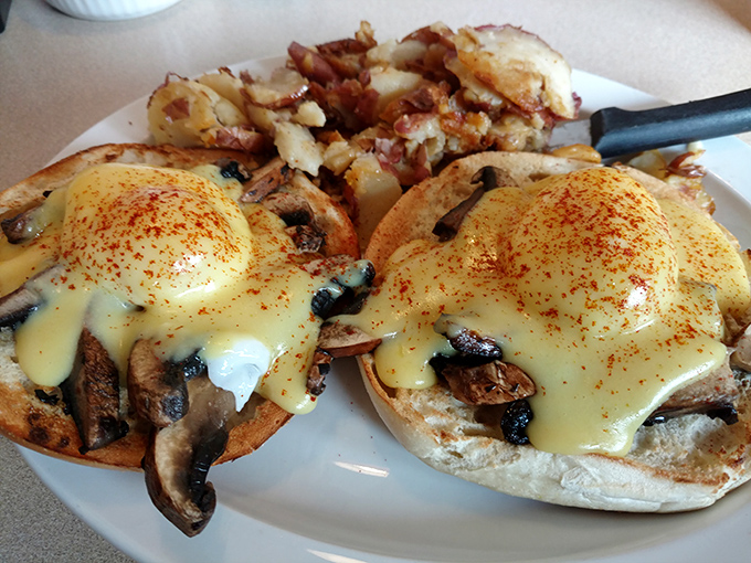 Eggs Benedict reimagined with mushrooms instead of Canadian bacon &ndash; a vegetarian plot twist worthy of an M. Night Shyamalan breakfast film.