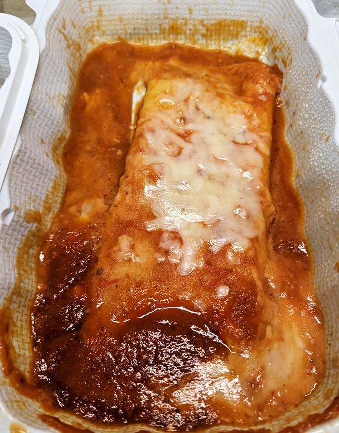 Not all enchiladas wear capes, but this saucy superhero draped in melted cheese and swimming in rich red sauce might just save your day.