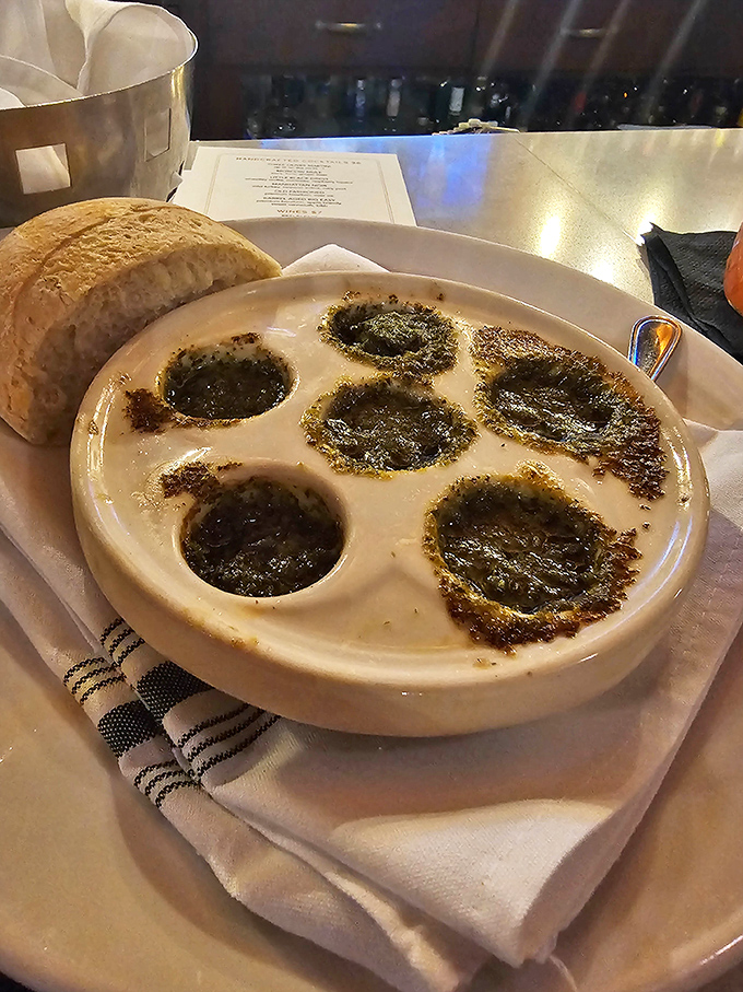 Escargot: where butter, garlic, and herbs transform something intimidating into something irresistible. Like dating in your 50s, but delicious.