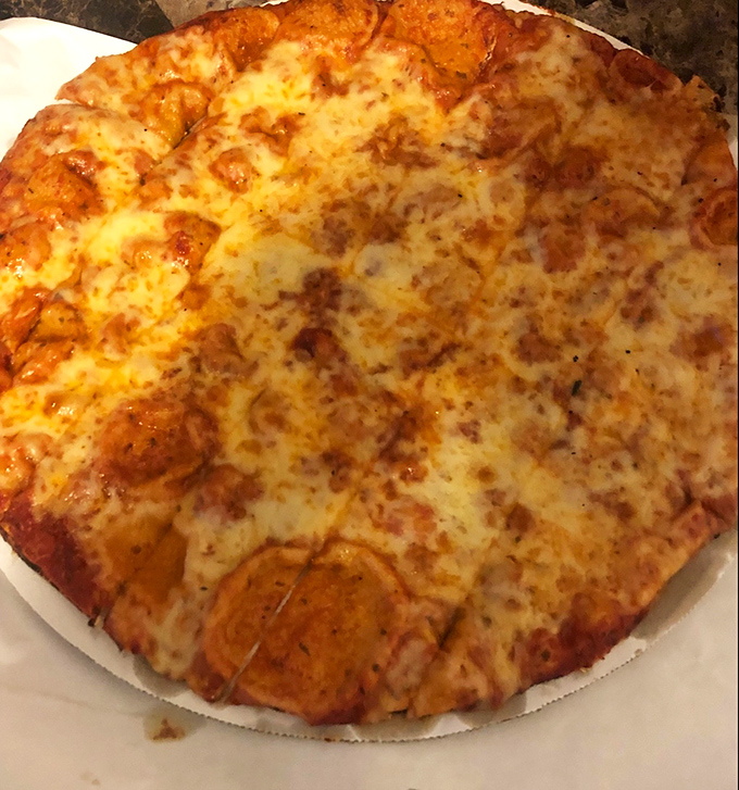 The square-cut thin crust pizza&mdash;a Columbus tradition that divides families, creates debates, and ultimately unites everyone in cheesy harmony.