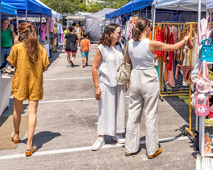 The local farmers market offers retail therapy with a tropical twist, where linen-clad shoppers browse colorful wares under the Florida sun.