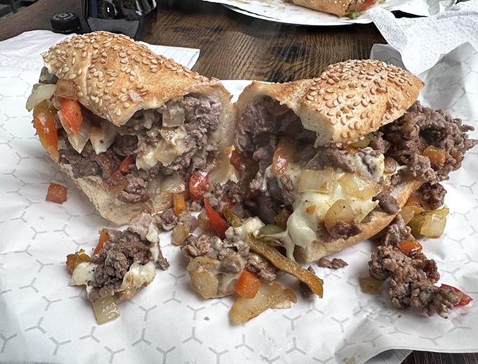 The filet mignon cheesesteak laughs in the face of sandwich convention, bringing steakhouse luxury to Philadelphia's most famous handheld meal.