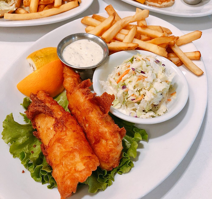 Fish and chips that would make a British pub jealous, with coleslaw so fresh it practically high-fives your taste buds.