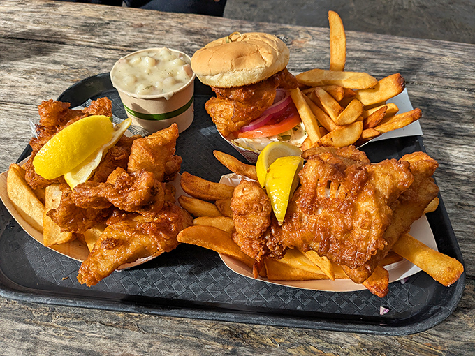 The seafood platter that launched a thousand road trips. Golden-battered fish, crispy fries, and that cup of chowder &ndash; the holy trinity of harbor dining.
