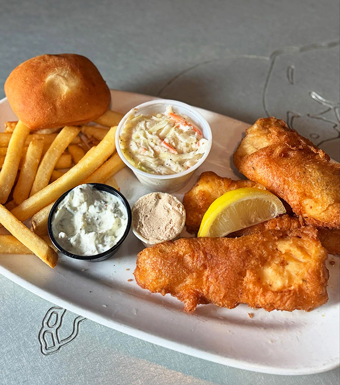 Fish and chips: beer-battered fish so crisp you can hear the crunch from the next table, paired with fries that strike the perfect balance of golden crunch and fluffy goodness.