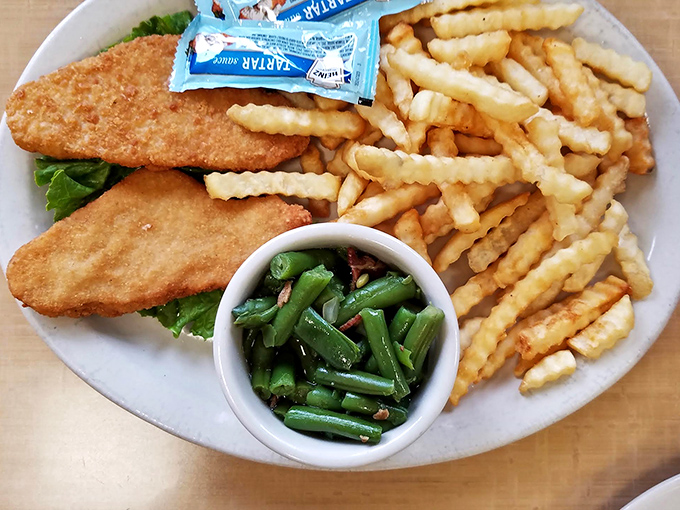 Fish and chips prove this diner doesn't limit itself to breakfast – crispy perfection any time of day.