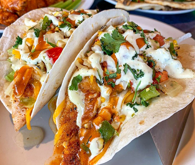 Fish tacos dressed for success with a confetti of fresh toppings. They're the kind of street food that graduated to table service without forgetting its roots.