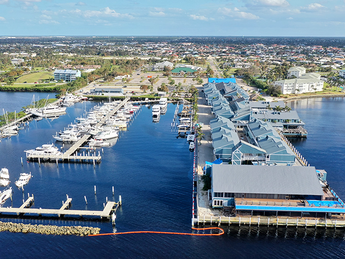 From above, Fishermen's Village reveals its true character&mdash;a perfect marriage of marina functionality and vacation-worthy blue rooftops stretching into the harbor.