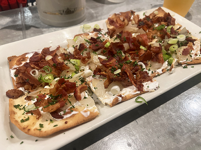 Not your college flatbread! This crispy canvas topped with bacon and herbs proves that German cuisine isn't all about the meat and potatoes.