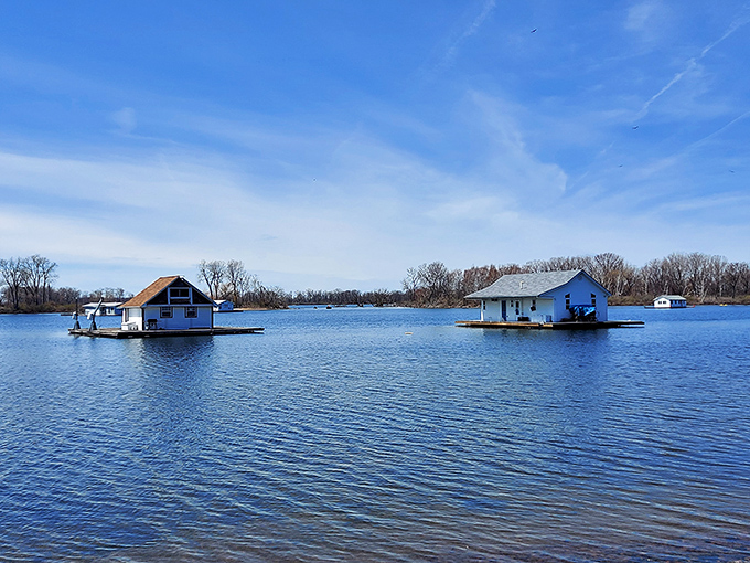 Floating houses dot the calm waters of Presque Isle Bay, proving that waterfront property takes on whole new meaning in Erie.