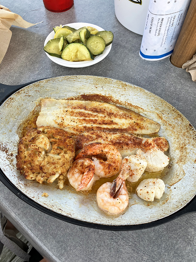 The seafood platter that answers the eternal question: "Why choose one when you can have it all?" A delicious democracy of Chesapeake favorites.