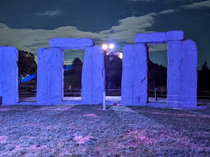 Under evening lights, Foamhenge transforms into a mystical blue wonderland. Druids would have loved this light show.