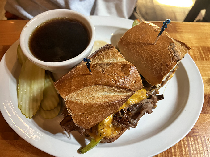 The French Dip: thinly sliced beef nestled in a crusty roll with that magical au jus waiting for its dipping destiny.