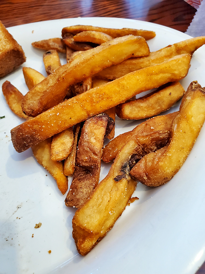 These aren't just French fries – they're golden happiness sticks with the perfect crisp-to-fluffy ratio that puts fast food to shame.
