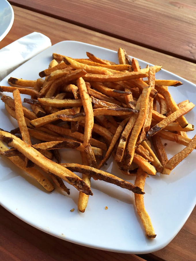 Hand-cut fries that make you question why you ever settled for the frozen kind. Crispy exterior, fluffy interior - the Goldilocks of potato preparation.