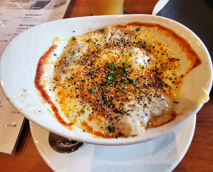 French onion soup that's worth the cheese pull photo op. A bubbling cauldron of comfort that's practically begging to be broken into.