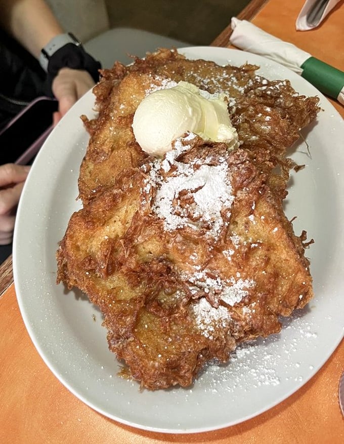 French toast that's had a spa treatment&mdash;golden, crispy exterior with a custardy soul, topped with butter melting like a snowflake in Phoenix.