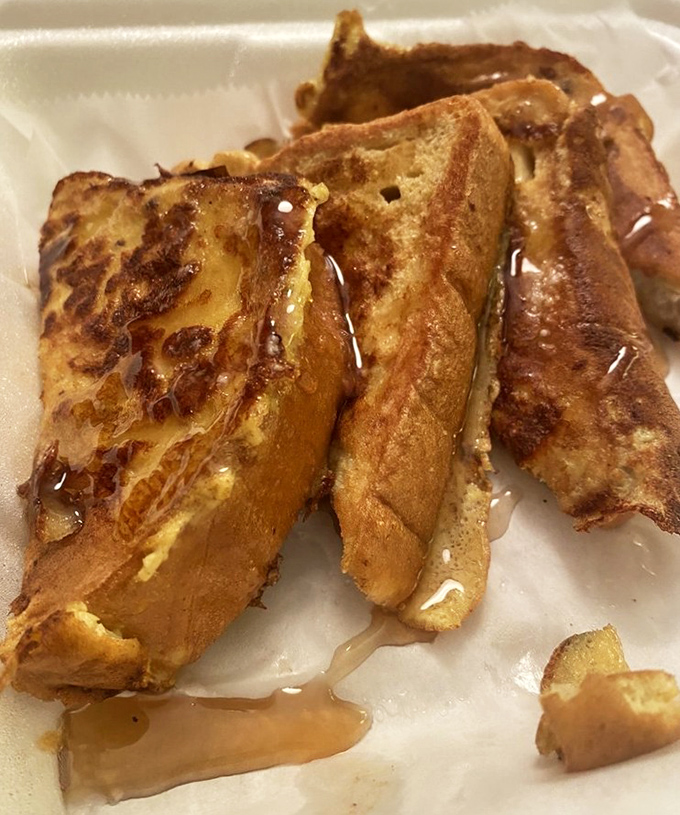 French toast that makes bread feel like it finally achieved its life purpose. Maple syrup river included at no extra charge.