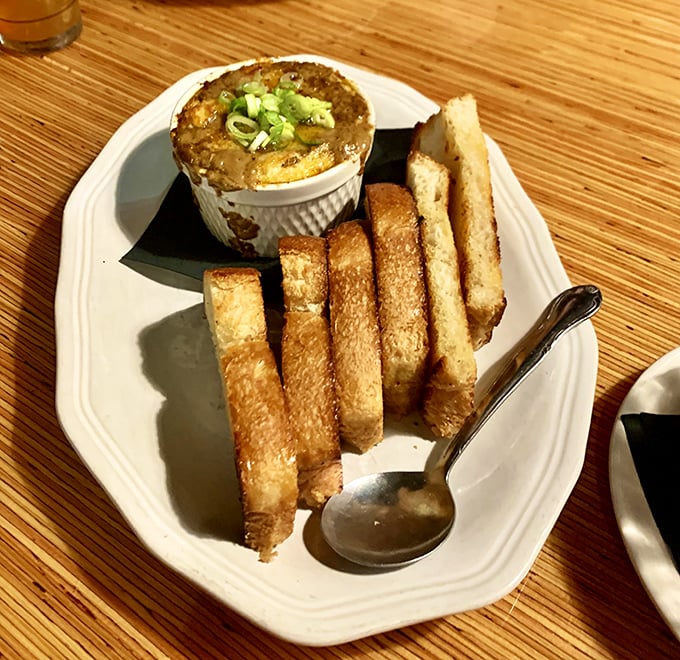 Breakfast meets dessert in these French toast sticks with what appears to be a savory dipping companion. Morning indulgence that makes alarm clocks worthwhile.
