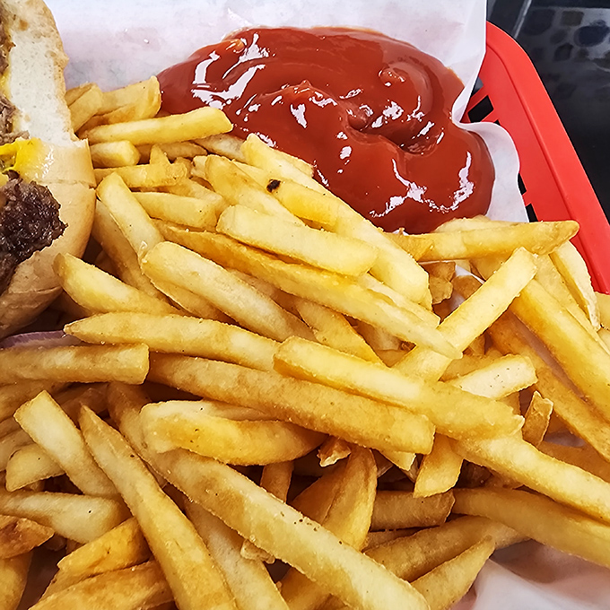 French fries done right&mdash;crispy on the outside, fluffy inside, and arranged in a golden pile that whispers, "Clear your afternoon schedule." 