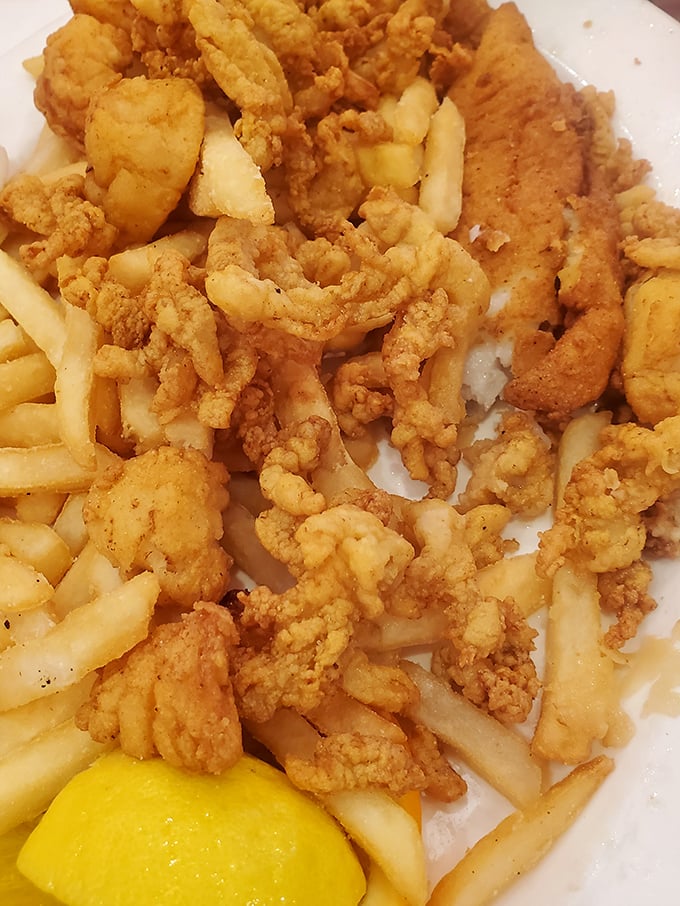 Golden-fried clam strips and crispy fries&mdash;the kind of plate that makes you wonder why you ever bother with fancy food when simple perfection exists.